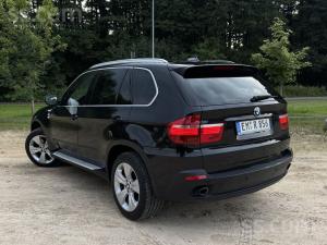 Black BMW X5 2009 in Riga, with an engine capacity of 3.00 L and mileage of 0 thousand km for 9700 €, photo 9 on AUTOMOTO.COM.LV