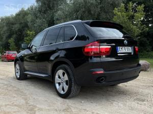 Black BMW X5 2009 in Riga, with an engine capacity of 3.00 L and mileage of 0 thousand km for 9700 €, photo 11 on AUTOMOTO.COM.LV