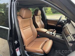 Black BMW X5 2009 in Riga, with an engine capacity of 3.00 L and mileage of 0 thousand km for 9700 €, photo 12 on AUTOMOTO.COM.LV