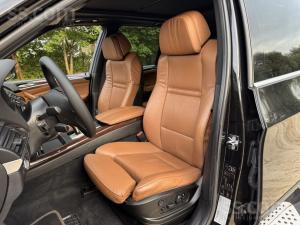 Black BMW X5 2009 in Riga, with an engine capacity of 3.00 L and mileage of 0 thousand km for 9700 €, photo 13 on AUTOMOTO.COM.LV