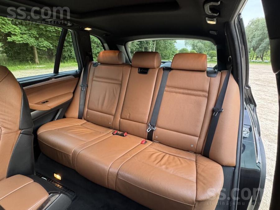 Black BMW X5 2009 in Riga, with an engine capacity of 3.00 L and mileage of 0 thousand km for 9700 €, photo 14 on AUTOMOTO.COM.LV