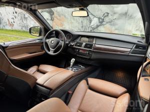 Black BMW X5 2009 in Riga, with an engine capacity of 3.00 L and mileage of 0 thousand km for 9700 €, photo 16 on AUTOMOTO.COM.LV