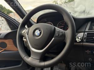 Black BMW X5 2009 in Riga, with an engine capacity of 3.00 L and mileage of 0 thousand km for 9700 €, photo 24 on AUTOMOTO.COM.LV