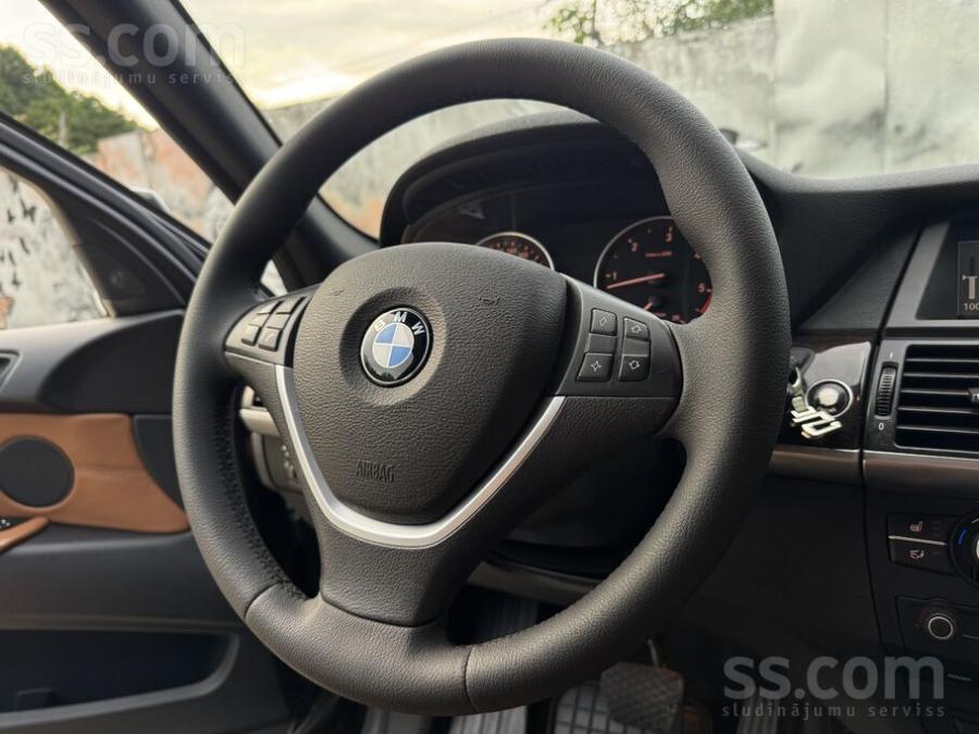 Black BMW X5 2009 in Riga, with an engine capacity of 3.00 L and mileage of 0 thousand km for 9700 €, photo 24 on AUTOMOTO.COM.LV