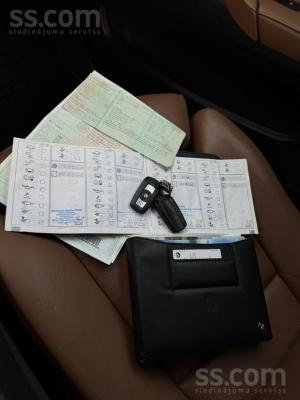 Black BMW X5 2009 in Riga, with an engine capacity of 3.00 L and mileage of 0 thousand km for 9700 €, photo 31 on AUTOMOTO.COM.LV
