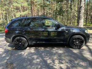 Melns BMW X5 2009 Rīga, ar dzinēja tilpumu 3.00 L un nobraukumu 309 tūkst. km par 9600 €, foto 8 vietnē AUTOMOTO.COM.LV