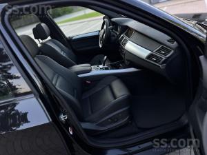 Black BMW X5 2009 in Jurmala, with an engine capacity of 3.00 L and mileage of 285 thousand km for 7990 €, photo 11 on AUTOMOTO.COM.LV