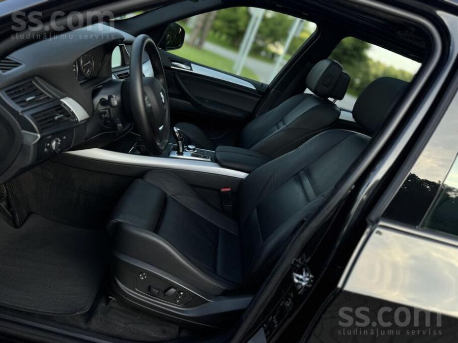Black BMW X5 2009 in Jurmala, with an engine capacity of 3.00 L and mileage of 285 thousand km for 7990 €, photo 12 on AUTOMOTO.COM.LV