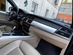 Black BMW X5 2009 in Daugavpils, with an engine capacity of 3.00 L and mileage of 236 thousand km for 9300 €, photo 14 on AUTOMOTO.COM.LV