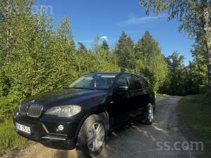 Black BMW X5 2009 in Kuldiga, with an engine capacity of 3.00 L and mileage of 339 thousand km for 7300 €, photo 9 on AUTOMOTO.COM.LV