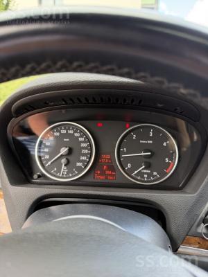 Black BMW X5 2009 in Riga, with an engine capacity of 3.00 L and mileage of 278 thousand km for 11750 €, photo 14 on AUTOMOTO.COM.LV