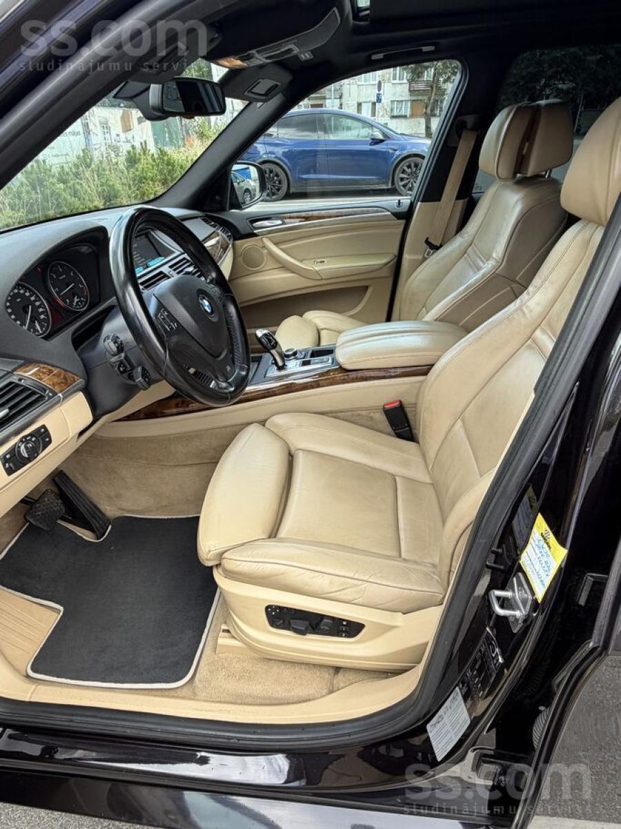 Black BMW X5 2009 in Riga, with an engine capacity of 3.00 L and mileage of 278 thousand km for 11750 €, photo 17 on AUTOMOTO.COM.LV