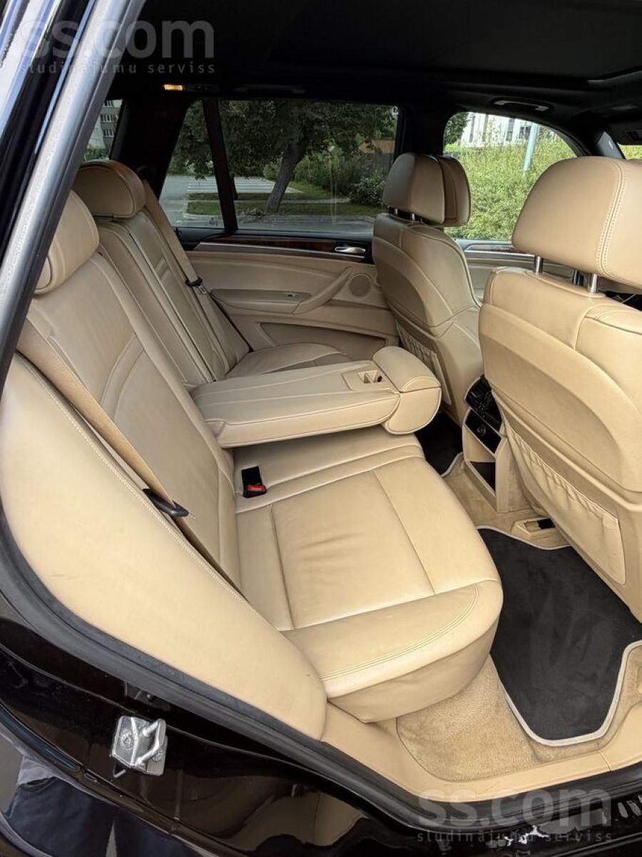 Black BMW X5 2009 in Riga, with an engine capacity of 3.00 L and mileage of 278 thousand km for 11750 €, photo 19 on AUTOMOTO.COM.LV