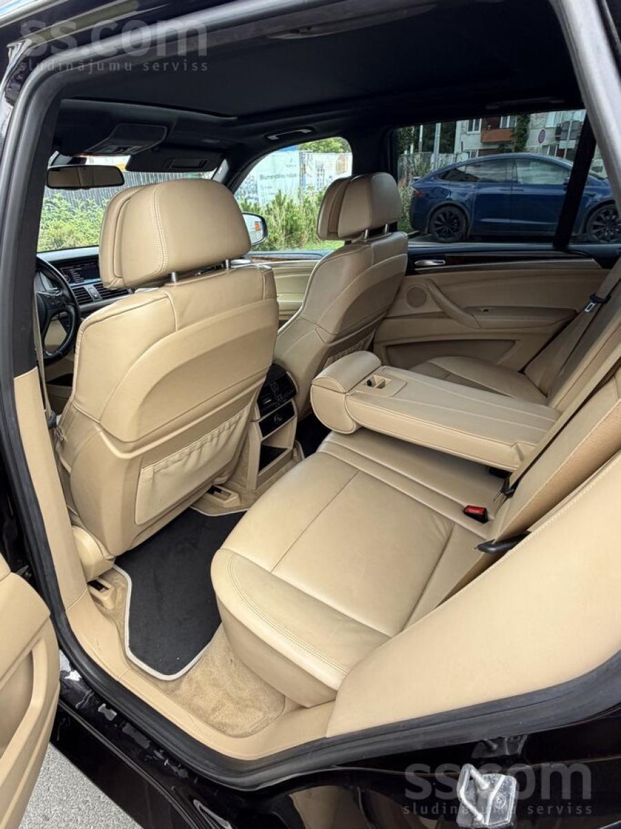 Black BMW X5 2009 in Riga, with an engine capacity of 3.00 L and mileage of 278 thousand km for 11750 €, photo 20 on AUTOMOTO.COM.LV