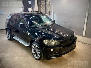 Black BMW X5 2009 in Madona, with an engine capacity of 3.00 L and mileage of 329 thousand km for 10600 €, photo 5 on AUTOMOTO.COM.LV