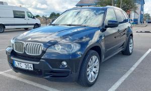Black BMW X5 2009 in Marijampole, with an engine capacity of 2.99 L and mileage of 350 thousand km for 7100 €, photo  on AUTOMOTO.COM.LV