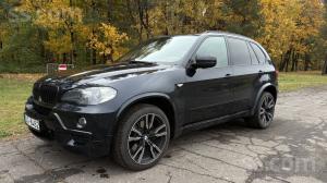 Black BMW X5 2009 in Riga, with an engine capacity of 3.00 L and mileage of 405 thousand km for 3500 €, photo  on AUTOMOTO.COM.LV
