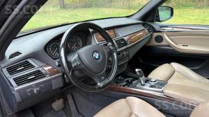 Black BMW X5 2009 in Riga, with an engine capacity of 3.00 L and mileage of 405 thousand km for 3500 €, photo 6 on AUTOMOTO.COM.LV