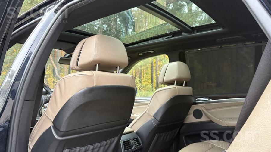 Black BMW X5 2009 in Riga, with an engine capacity of 3.00 L and mileage of 405 thousand km for 3500 €, photo 7 on AUTOMOTO.COM.LV