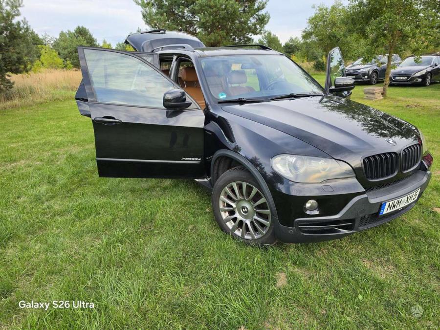 Melns BMW X5 2009 Jonava, ar dzinēja tilpumu 2.99 L un nobraukumu 279 tūkst. km par 7499 €, foto 25 vietnē AUTOMOTO.COM.LV