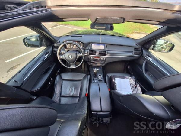 Black BMW X5 2009 in Riga, with an engine capacity of 3.00 L and mileage of 330 thousand km for 10900 €, photo 9 on AUTOMOTO.COM.LV