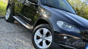 Black BMW X5 2010 in Jurmala, with an engine capacity of 3.00 L and mileage of 0 thousand km for 10950 €, photo 12 on AUTOMOTO.COM.LV