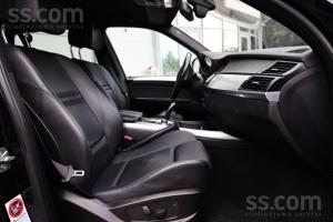 Black BMW X5 2010 in Riga, with an engine capacity of 3.00 L and mileage of 0 thousand km for 10995 €, photo 17 on AUTOMOTO.COM.LV