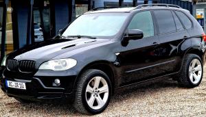 Black BMW X5 2010 in Kretinga, with an engine capacity of 3.00 L and mileage of 111 thousand km for 10950 €, photo 6 on AUTOMOTO.COM.LV