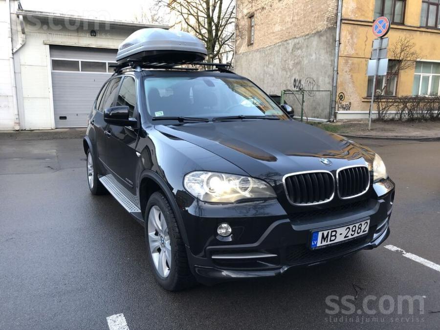 Black BMW X5 2010 in Riga, with an engine capacity of 3.00 L and mileage of 342 thousand km for 9499 €, photo 1 on AUTOMOTO.COM.LV