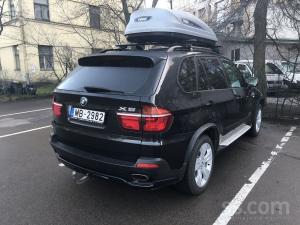 Black BMW X5 2010 in Riga, with an engine capacity of 3.00 L and mileage of 342 thousand km for 9499 €, photo 4 on AUTOMOTO.COM.LV