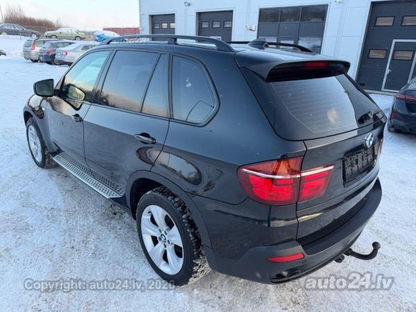 Black BMW X5 2010 in Tartu, with an engine capacity of 3.00 L and mileage of 200 thousand km for 9999 €, photo 10 on AUTOMOTO.COM.LV