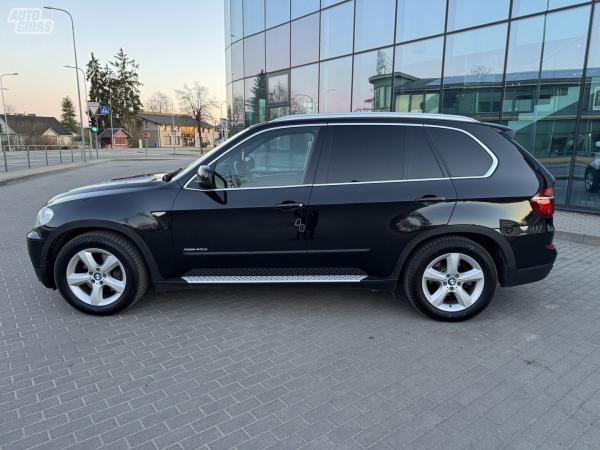 Black BMW X5 2010 in Utena, with an engine capacity of 3.00 L and mileage of 238 thousand km for 11490 €, photo 6 on AUTOMOTO.COM.LV