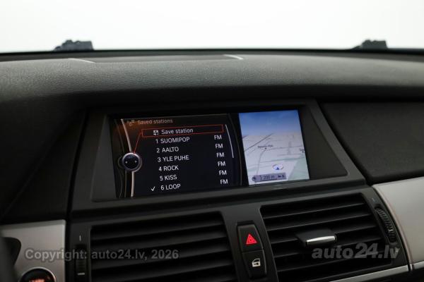 Black BMW X5 2010 in Tallinn, with an engine capacity of 3.00 L and mileage of 249 thousand km for 7499 €, photo 9 on AUTOMOTO.COM.LV