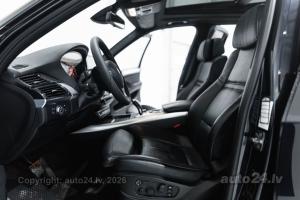 Black BMW X5 2010 in Tallinn, with an engine capacity of 3.00 L and mileage of 321 thousand km for 9990 €, photo 13 on AUTOMOTO.COM.LV