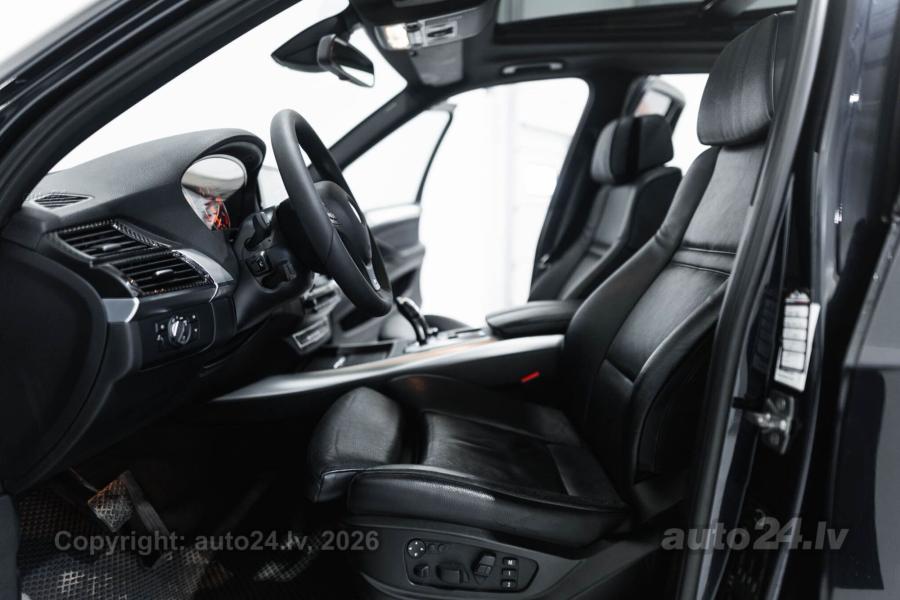 Black BMW X5 2010 in Tallinn, with an engine capacity of 3.00 L and mileage of 321 thousand km for 9990 €, photo 13 on AUTOMOTO.COM.LV