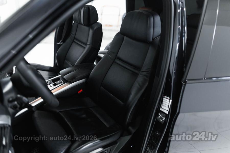 Black BMW X5 2010 in Tallinn, with an engine capacity of 3.00 L and mileage of 321 thousand km for 9990 €, photo 14 on AUTOMOTO.COM.LV