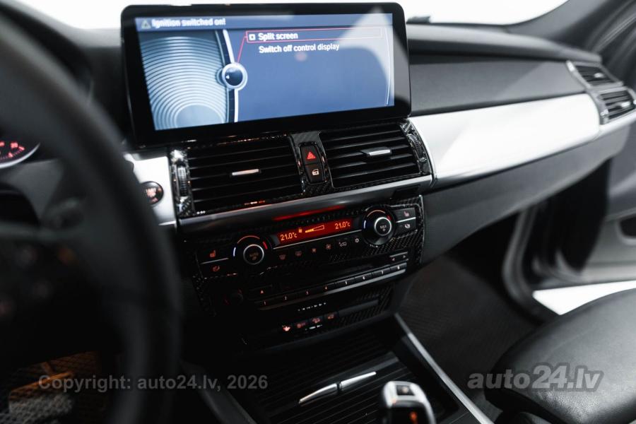 Black BMW X5 2010 in Tallinn, with an engine capacity of 3.00 L and mileage of 321 thousand km for 9990 €, photo 24 on AUTOMOTO.COM.LV
