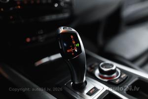 Black BMW X5 2010 in Tallinn, with an engine capacity of 3.00 L and mileage of 321 thousand km for 9990 €, photo 29 on AUTOMOTO.COM.LV