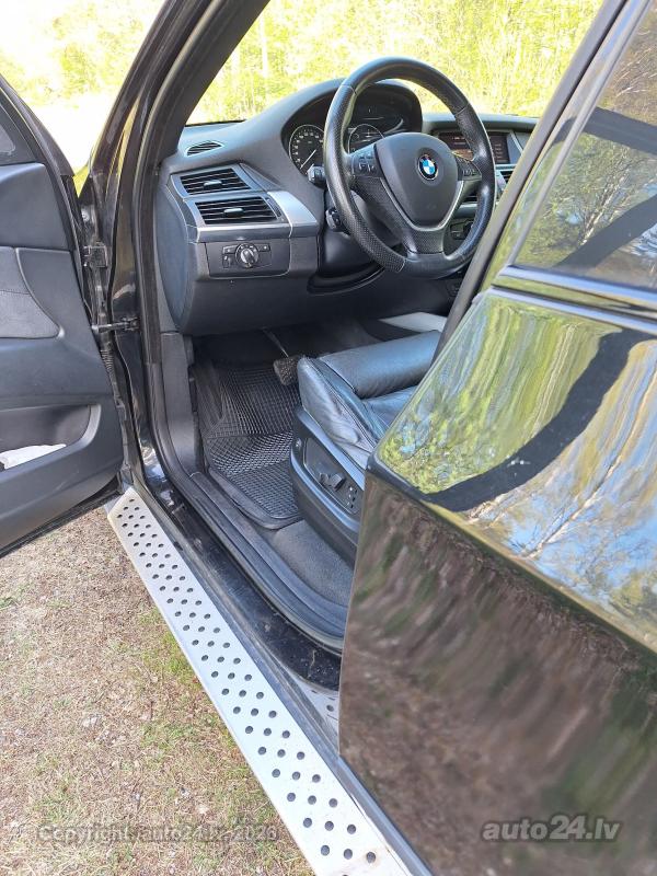 Black BMW X5 2010 in Parnu, with an engine capacity of 3.00 L and mileage of 346 thousand km for 10400 €, photo 6 on AUTOMOTO.COM.LV
