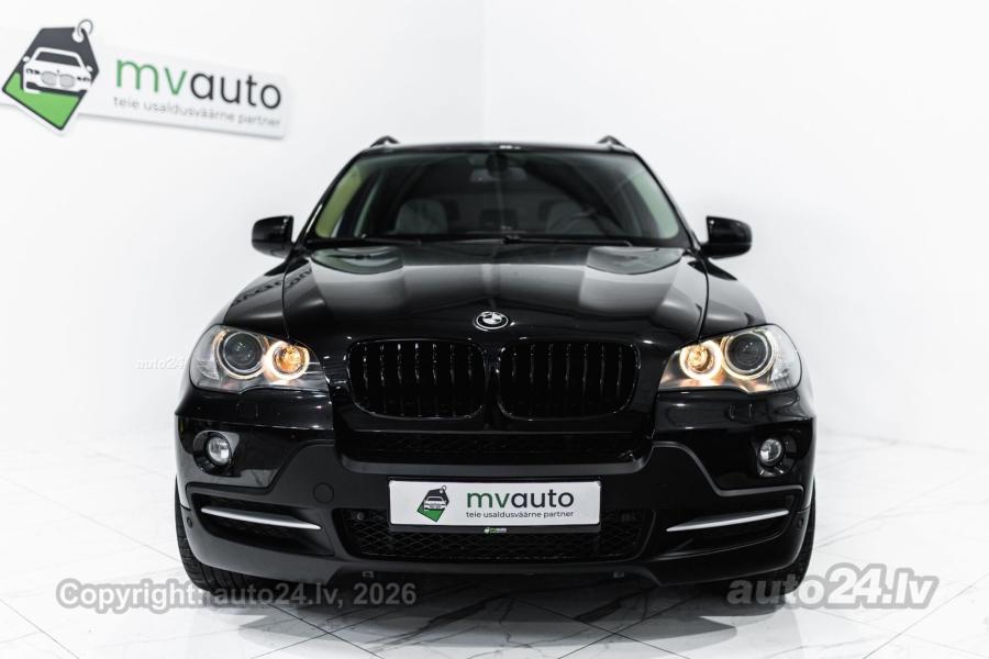 Black BMW X5 2010 in Tallinn, with an engine capacity of 3.00 L and mileage of 388 thousand km for 7990 €, photo 5 on AUTOMOTO.COM.LV