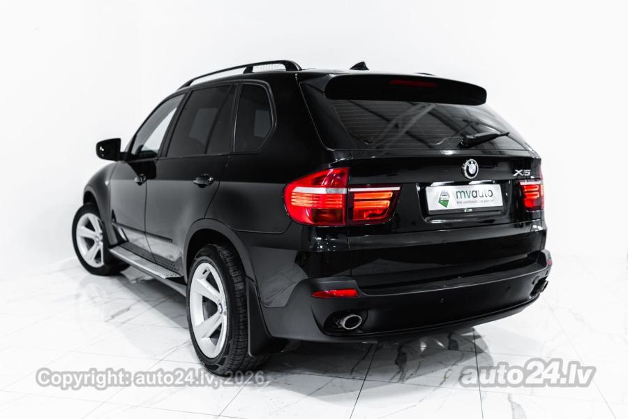 Black BMW X5 2010 in Tallinn, with an engine capacity of 3.00 L and mileage of 388 thousand km for 7990 €, photo 7 on AUTOMOTO.COM.LV