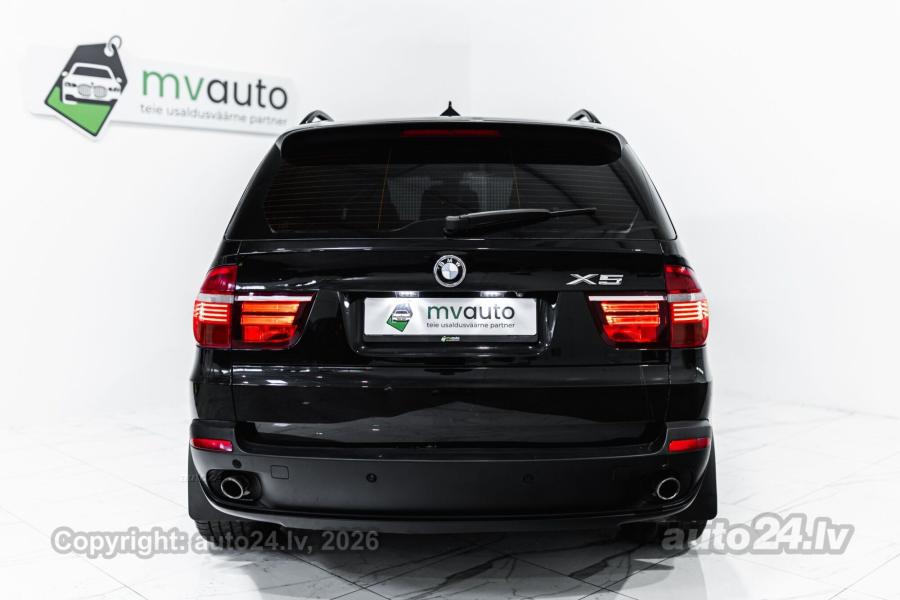 Black BMW X5 2010 in Tallinn, with an engine capacity of 3.00 L and mileage of 388 thousand km for 7990 €, photo 8 on AUTOMOTO.COM.LV