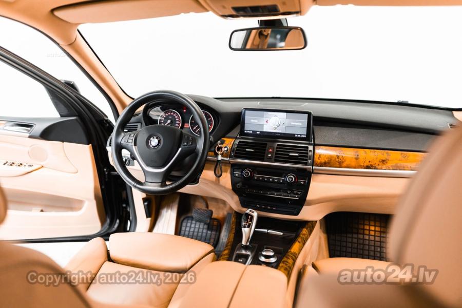 Black BMW X5 2010 in Tallinn, with an engine capacity of 3.00 L and mileage of 388 thousand km for 7990 €, photo 15 on AUTOMOTO.COM.LV