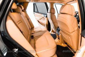 Black BMW X5 2010 in Tallinn, with an engine capacity of 3.00 L and mileage of 388 thousand km for 7990 €, photo 18 on AUTOMOTO.COM.LV