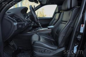 Black BMW X5 2010 in Riga, with an engine capacity of 3.00 L and mileage of 0 thousand km for 9495 €, photo 12 on AUTOMOTO.COM.LV