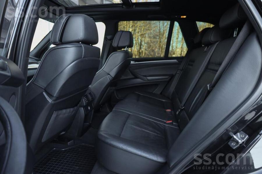 Black BMW X5 2010 in Riga, with an engine capacity of 3.00 L and mileage of 0 thousand km for 9495 €, photo 18 on AUTOMOTO.COM.LV