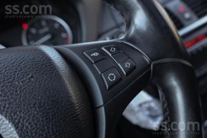 Black BMW X5 2010 in Riga, with an engine capacity of 3.00 L and mileage of 0 thousand km for 9495 €, photo 21 on AUTOMOTO.COM.LV
