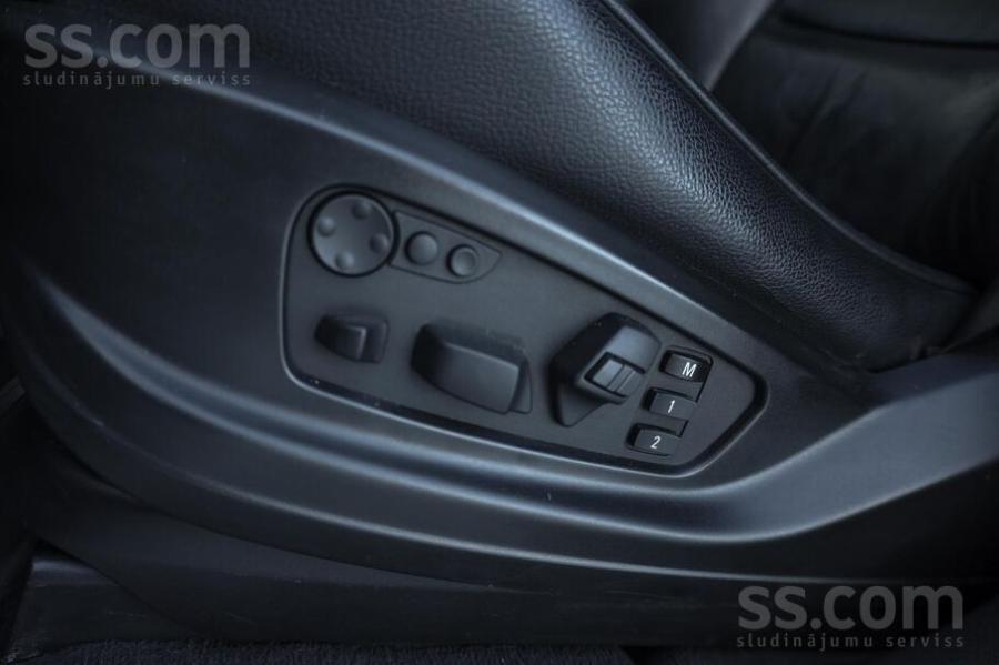 Black BMW X5 2010 in Riga, with an engine capacity of 3.00 L and mileage of 0 thousand km for 9495 €, photo 23 on AUTOMOTO.COM.LV