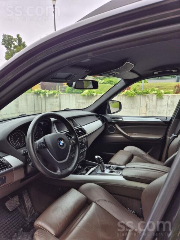 Melns BMW X5 2010 Bauska, ar dzinēja tilpumu 3.00 L un nobraukumu 251 tūkst. km par 9299 €, foto 8 vietnē AUTOMOTO.COM.LV