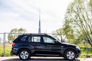 Black BMW X5 2010 in Riga, with an engine capacity of 3.00 L and mileage of 310 thousand km for 12990 €, photo 6 on AUTOMOTO.COM.LV